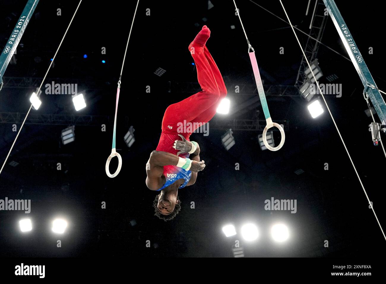 Frederick Richard, of the United States, performs on the rings during ...