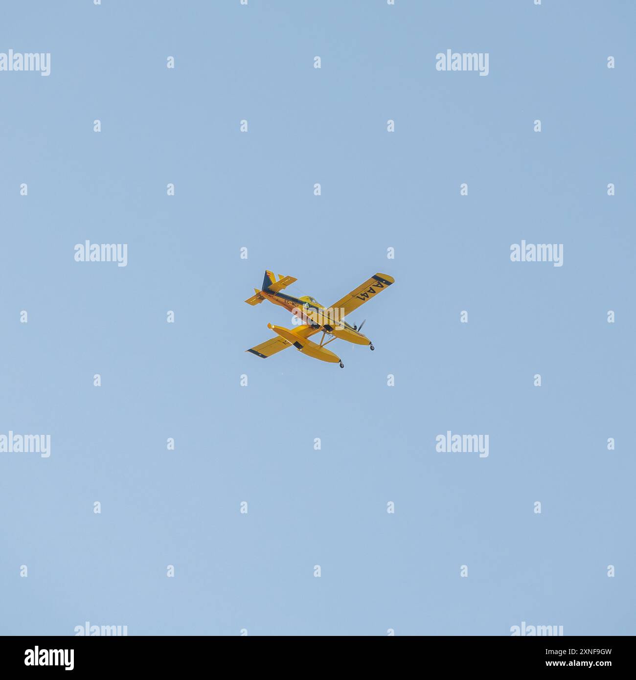 Firefighting plane flying into a large smoke cloud caused by a forest ...