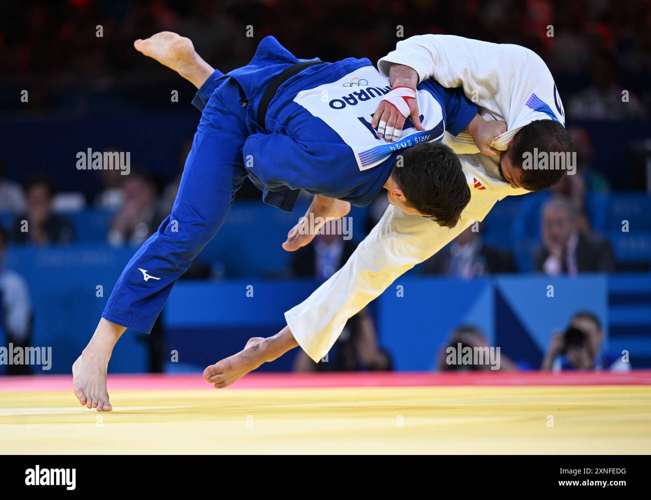 Paris, France. 31st July, 2024. Lasha Bekauri (white) of Georgia ...