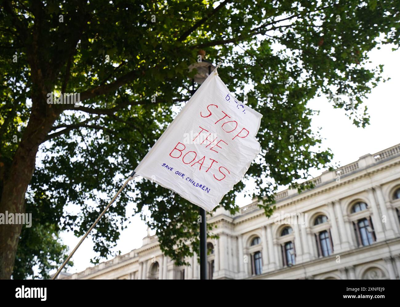 A placard read 'Stop The Boats' ahead of the 'Enough is Enough' protest ...