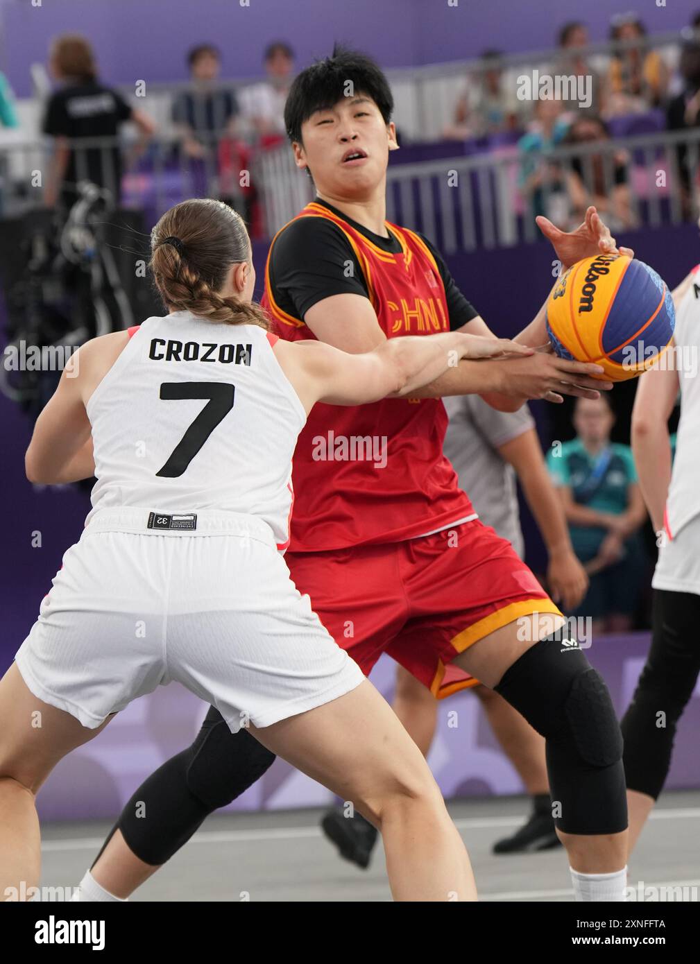 Paris, France. 31st July, 2024. Chen Mingling (R) of China launches an attack during the 3x3 ...