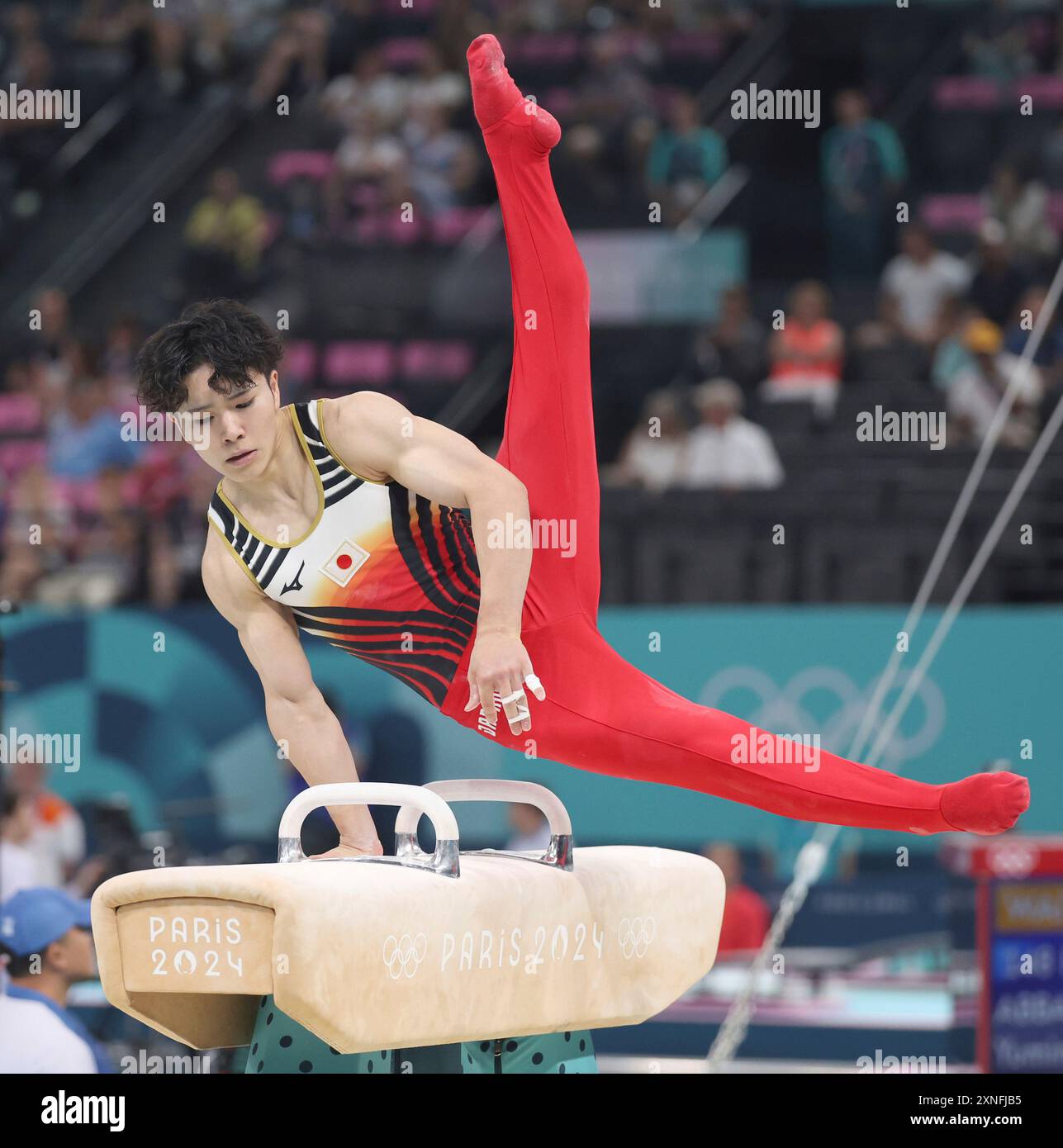 Japan's Shinnosuke Oka performs the Pommel Horse during the Men's All-around Final in the Paris ...