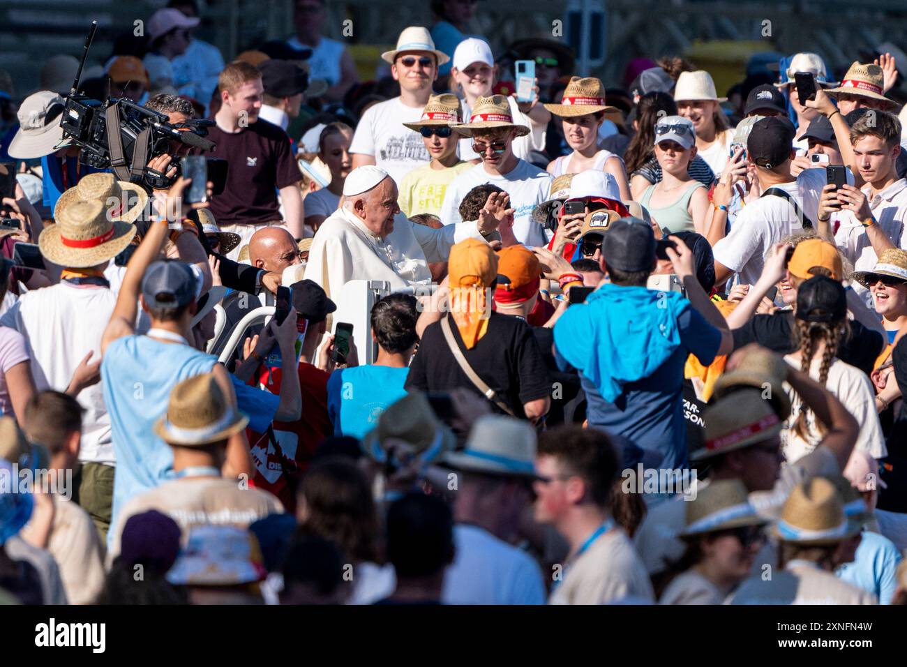 Pope Francis arrives at St. Peter's Square to meet participants in the ...