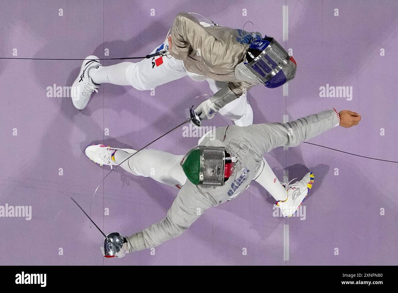 France's Sebastien Patrice, top, and Iran's Farzad Baher Arasbaran ...