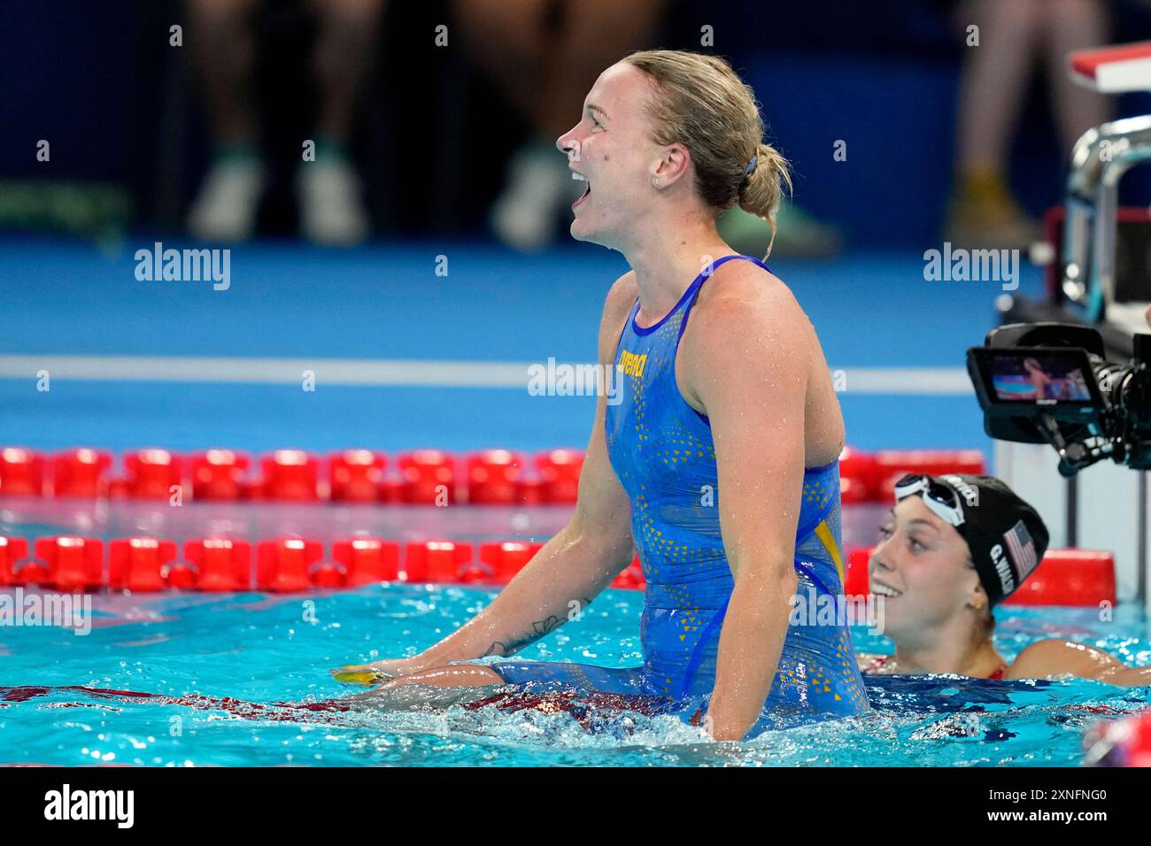 Sarah Sjoestroem of Sweden, celebrates after winning the women's 100 ...