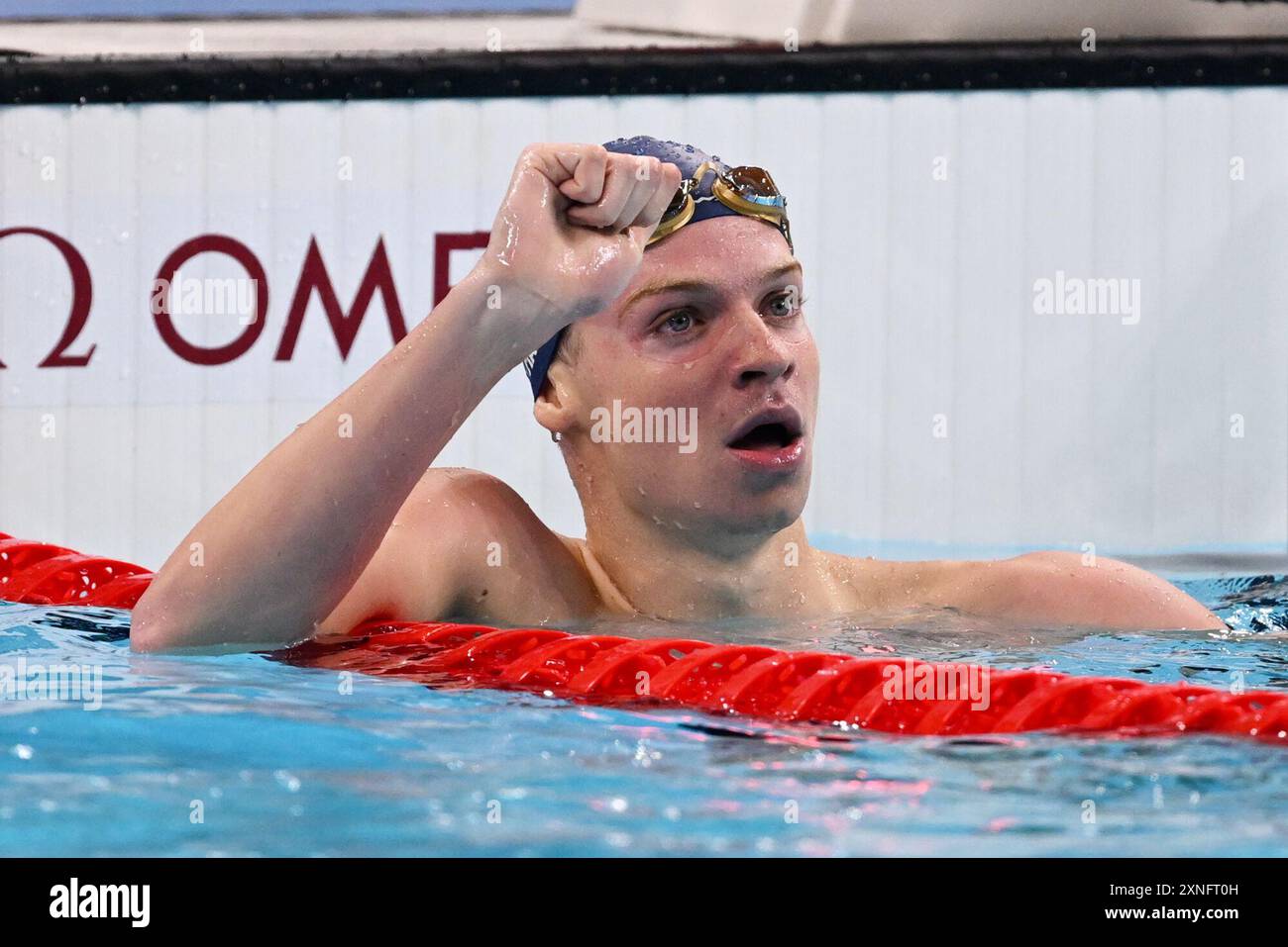 Paris, France. 31st July, 2024. French swimmer Léon Marchand reacts ...