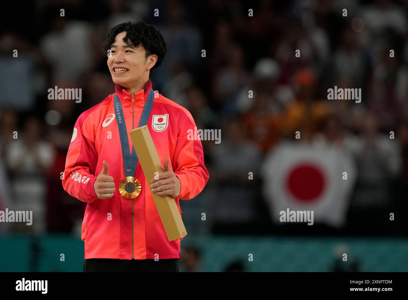Shinnosuke Oka, of Japan, celebrates after winning the gold medal ...