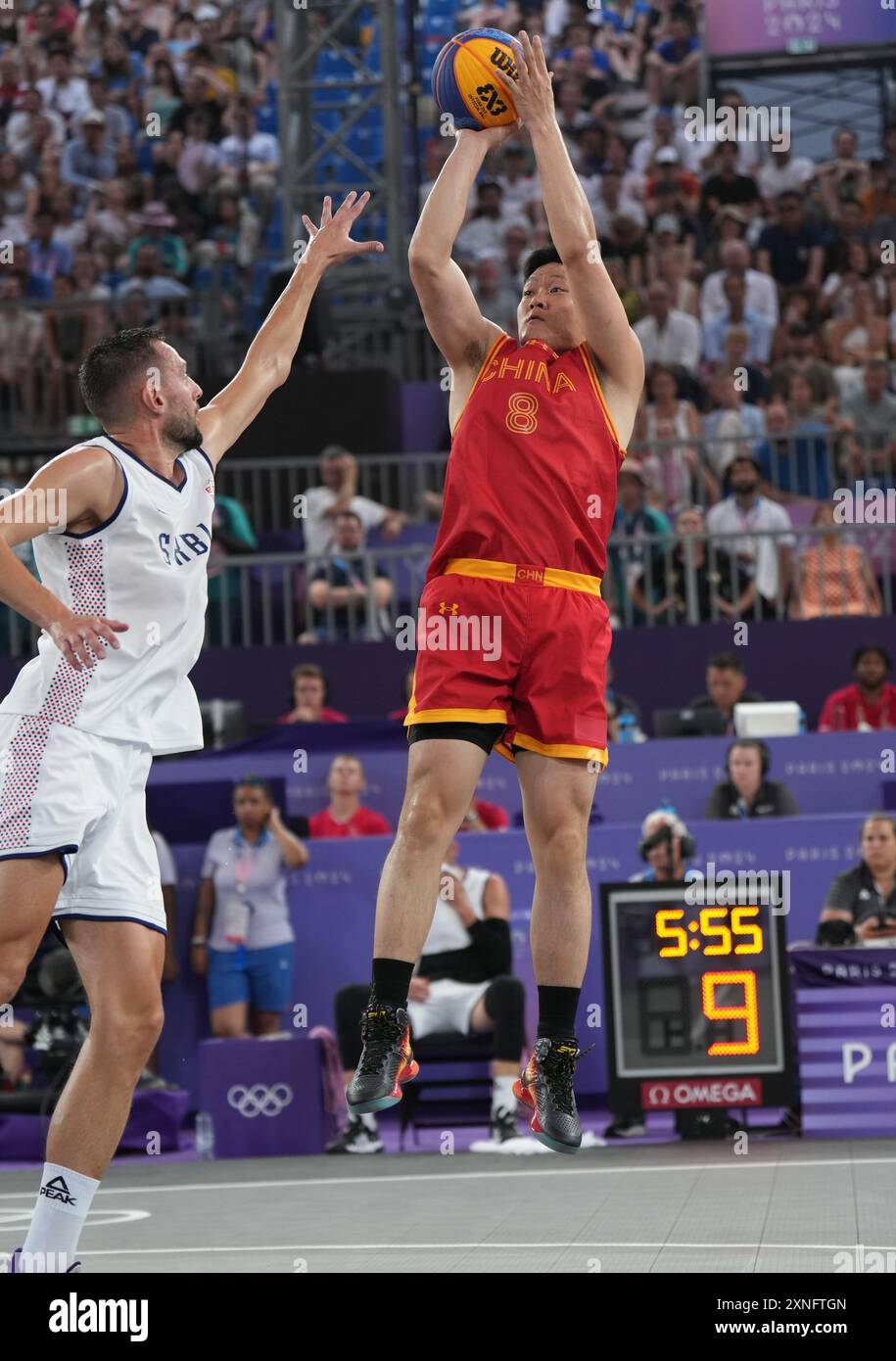 Paris, France. 31st July, 2024. Zhang Ning (R) of China takes a shot during the 3x3 basketball ...