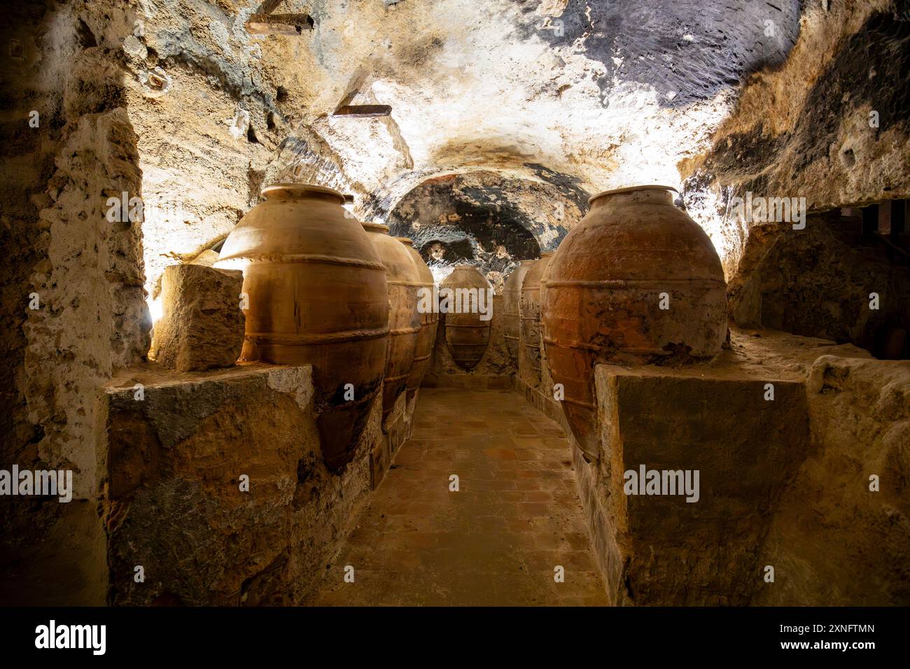 Huge clay jars in one of the caves of the town of Requena, Valencia ...