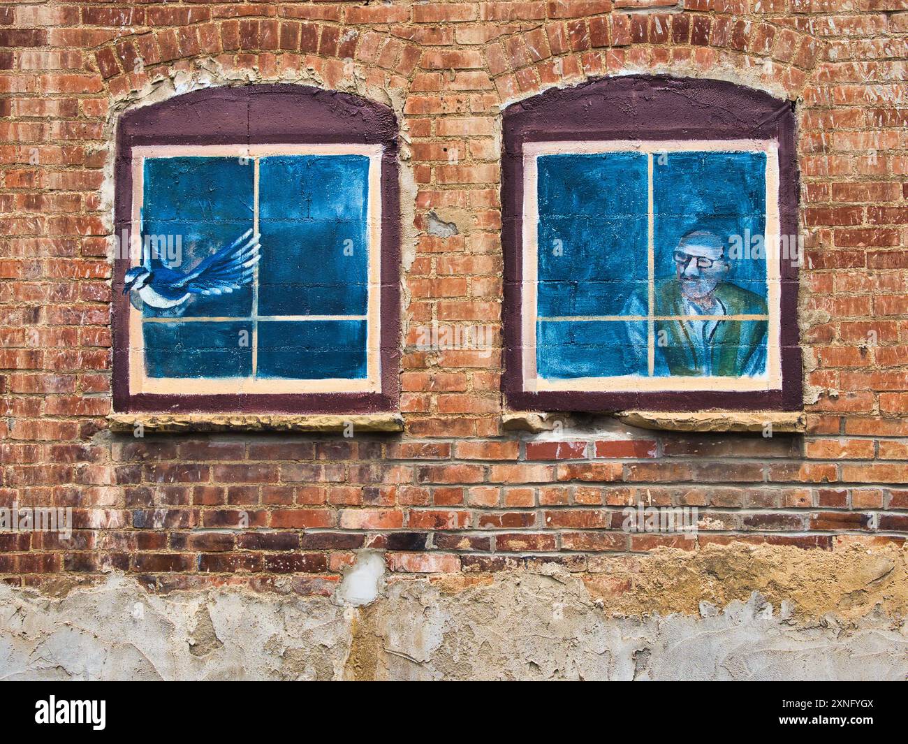 Painted mural of people looking out windows in downtown Mount Vernon ...