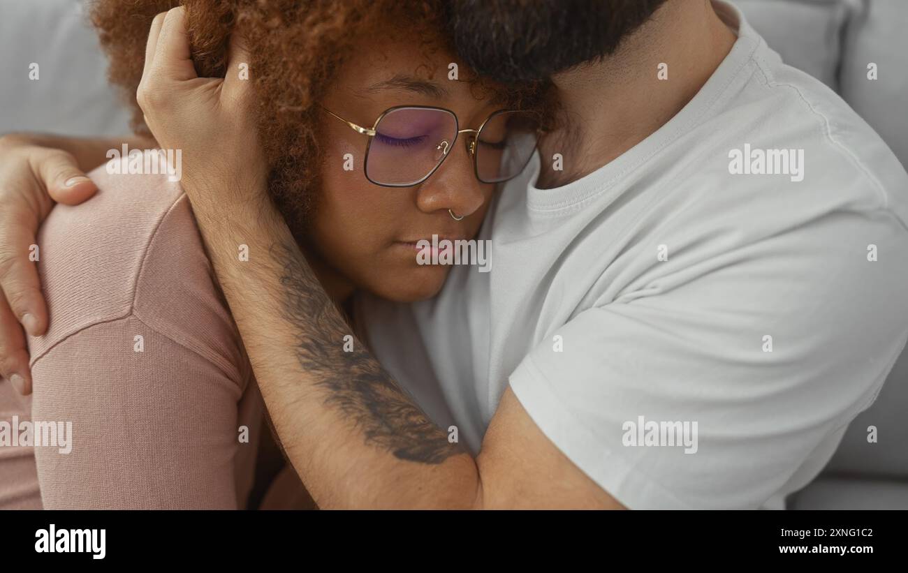 Intimate moment of a multicultural couple embracing, highlighting ... Intimate moment of a multicultural couple embracing, highlighting ...
