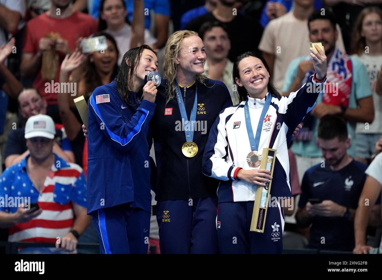 (L-R) USA's Torri Huske, Sweden's Sarah Sjostrom and Hong Kong's ...