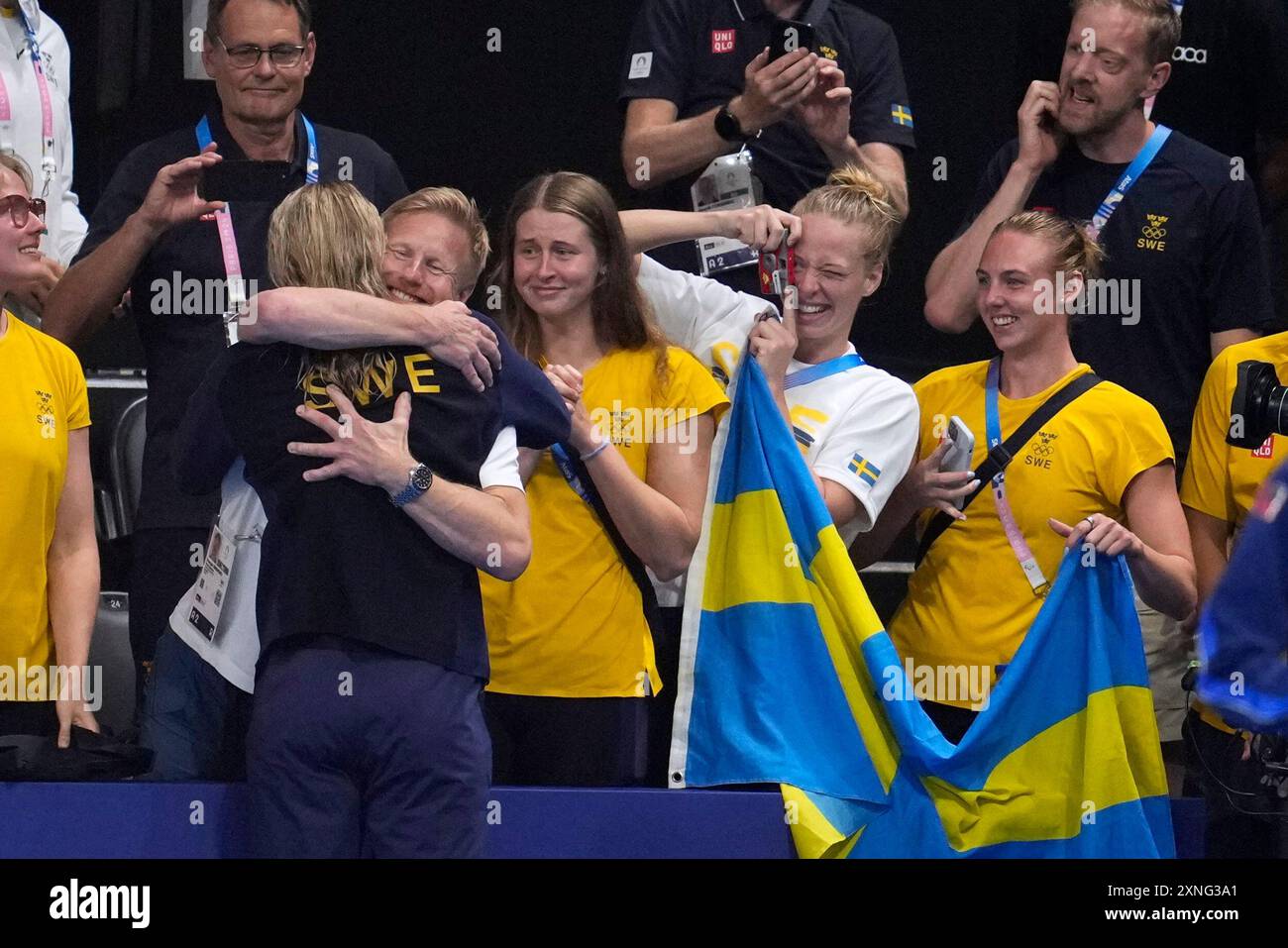 Gold medalist Sarah Sjoestroem, of Sweden, is hugged after the women's ...