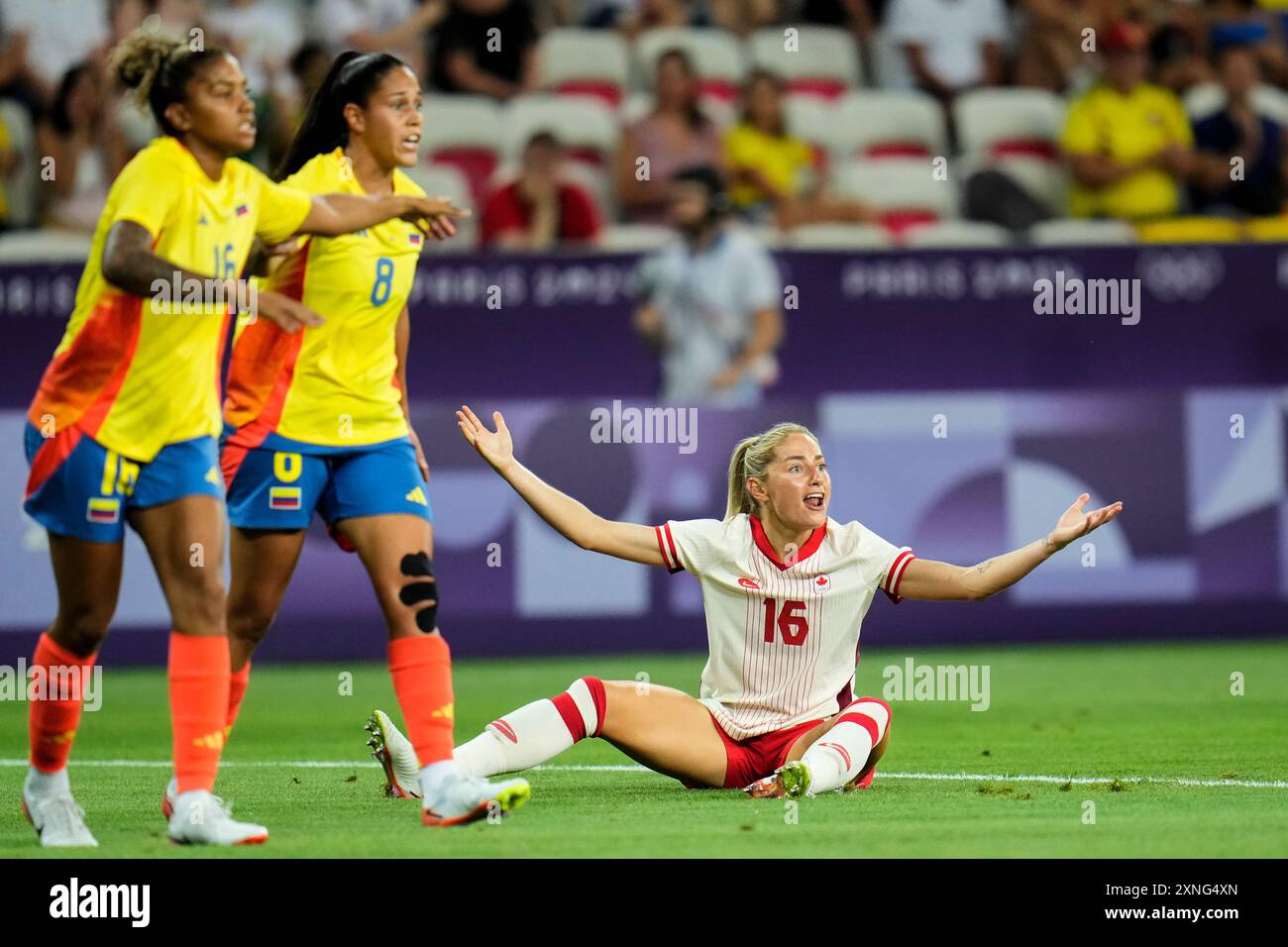 Canada's Janine Beckie, right, reacts during a women's Group A soccer ...