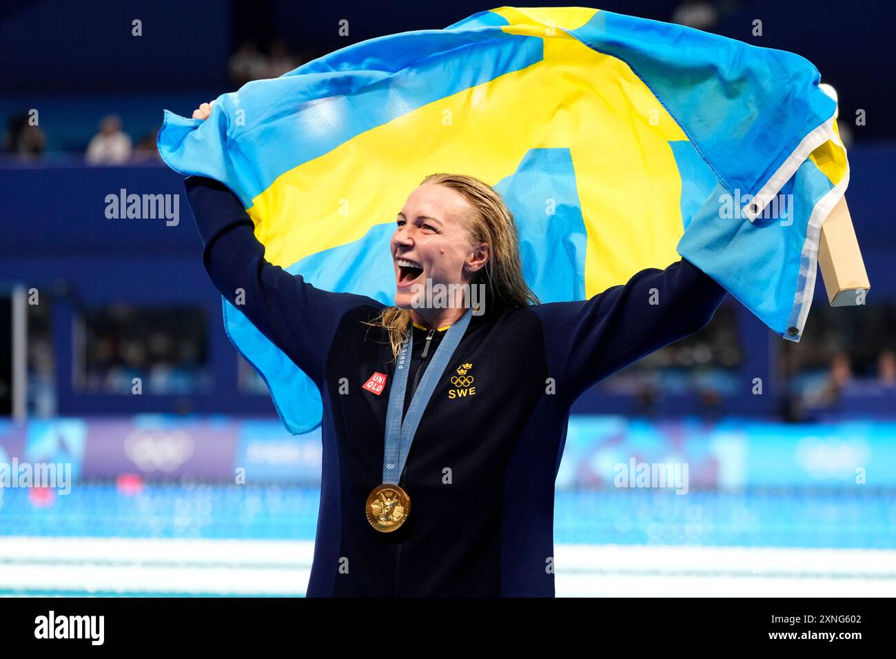 Gold medalist Sarah Sjoestroem, of Sweden, poses after the women's 100 ...