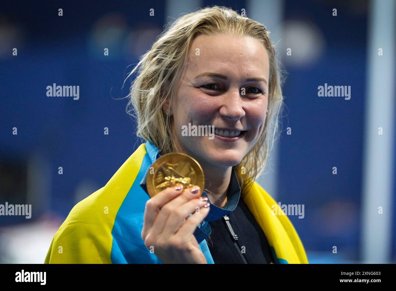 Gold medalist Sarah Sjoestroem, of Sweden, poses after the women's 100 ...