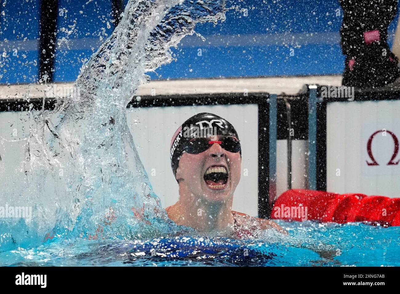 Katie Ledecky, of the United States, celebrates after winning the women ...