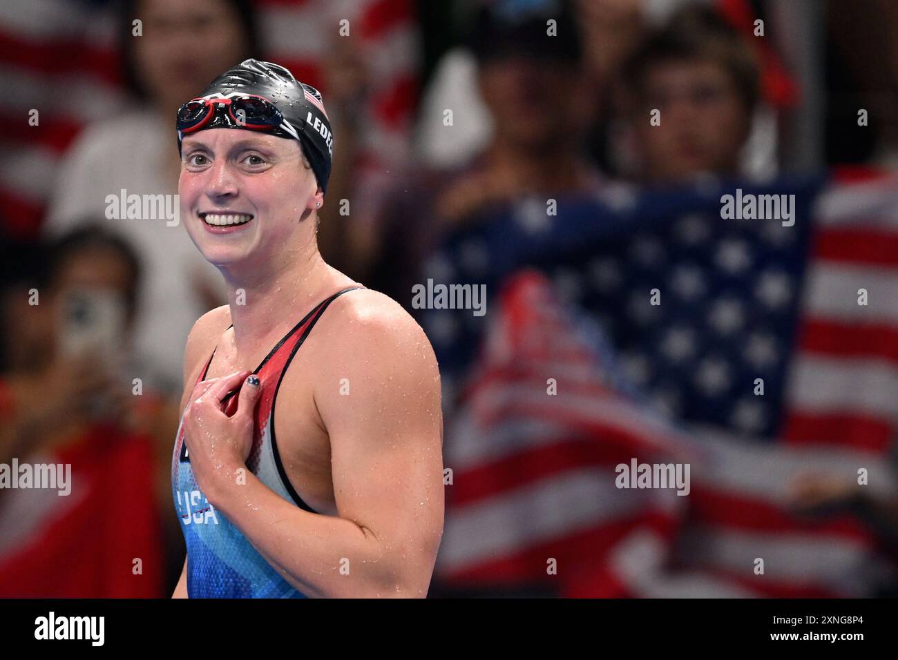 Paris, France. 31st July, 2024. American swimmer Katie Ledecky reacts ...