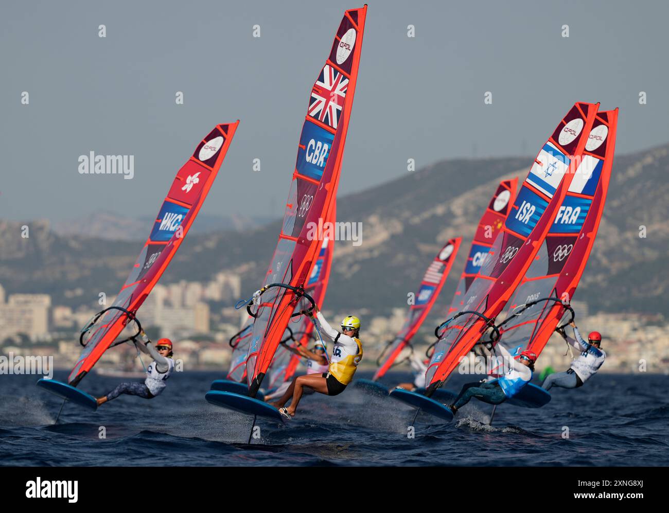 Emma Wilson of Britain leads the women's iQFOiL windsurfing class fleet ...
