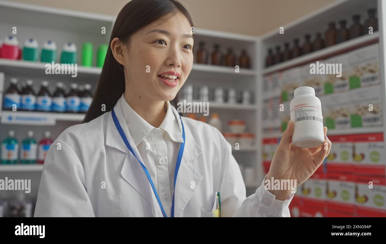 Asian female pharmacy employee hi-res stock photography and images - Alamy