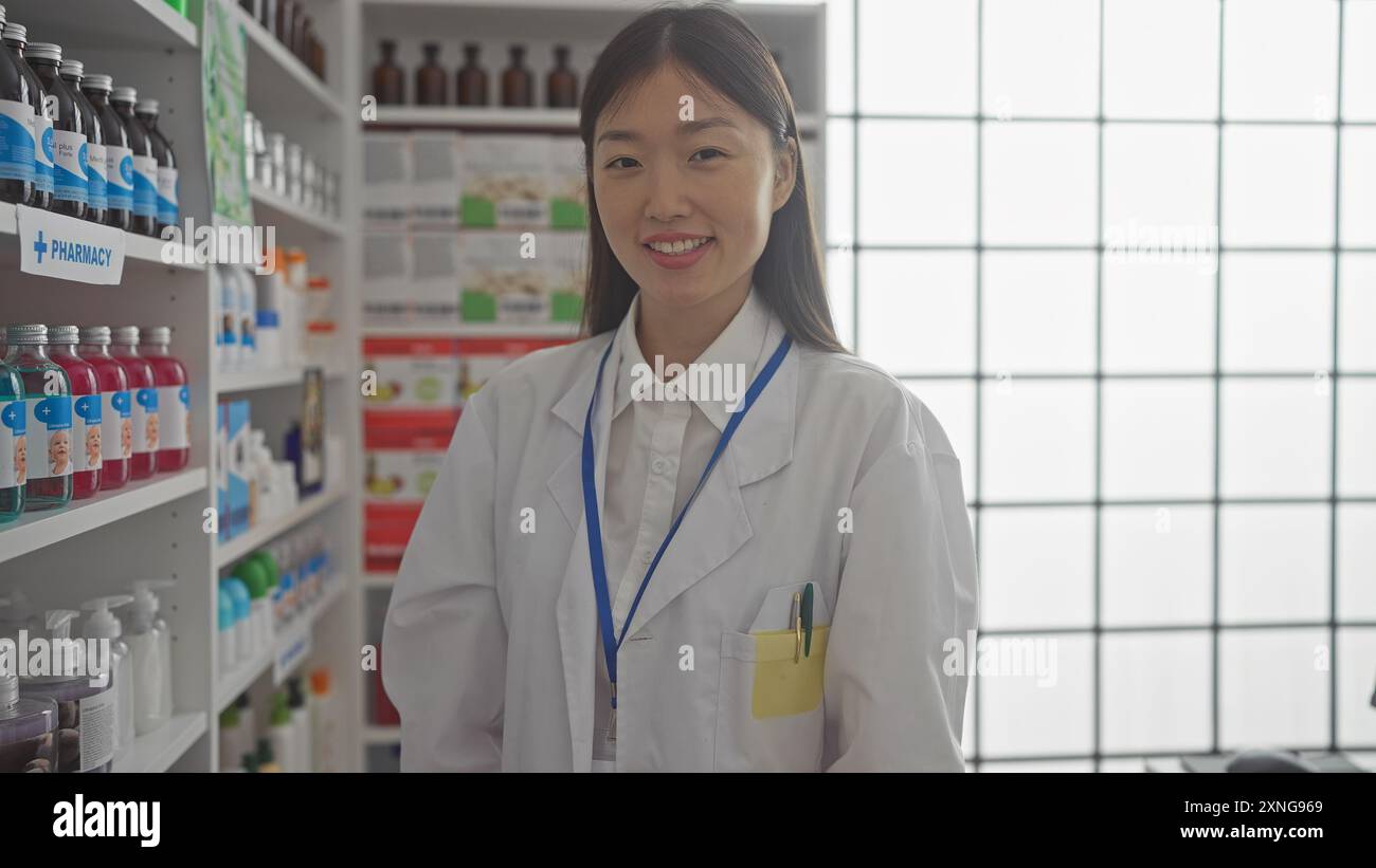 Smiling asian woman pharmacist hi-res stock photography and images - Alamy