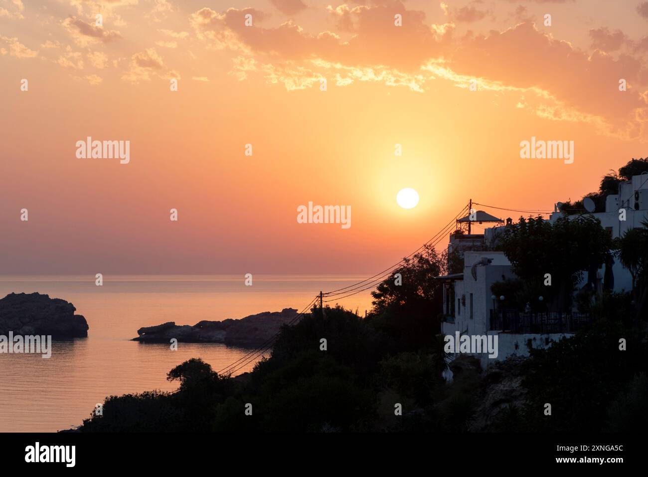 A Sunset Sky over Lindos, on the Greek island of Rhodes Stock Photo - Alamy