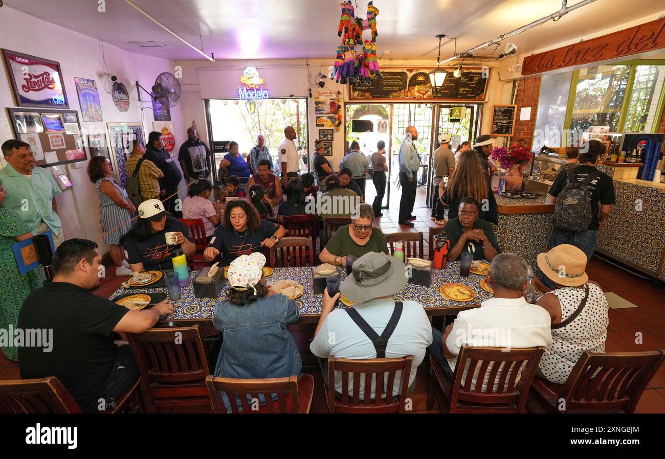 IMAGE DISTRIBUTED FOR PEPSICO – Customers line up for the free lunch ...