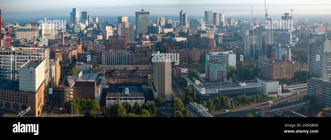 Aerial view of Manchester cityscape with skyscrapers and construction ...