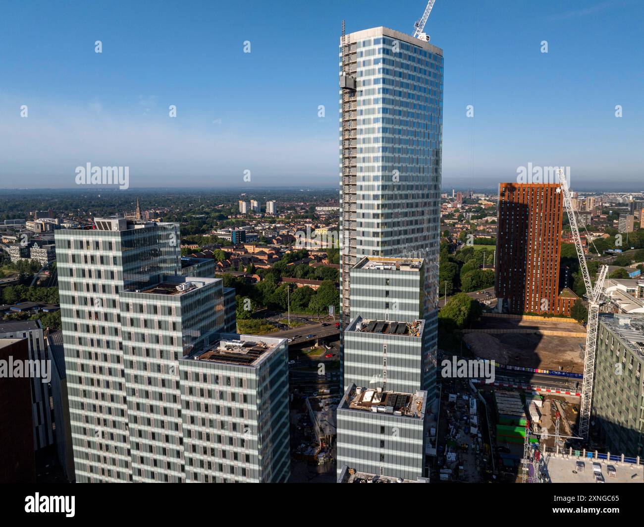 Aerial view of a bustling Manchester Skyline with skyscrapers under ...