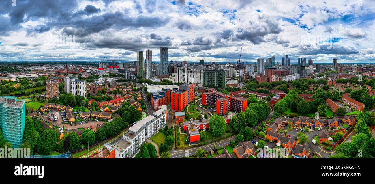 Aerial view of Manchester cityscape with skyscrapers and construction ...
