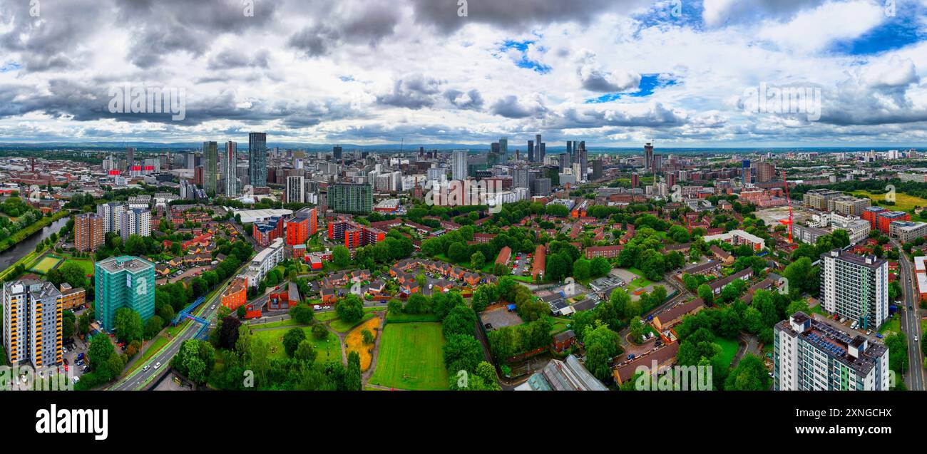 Aerial view of Manchester cityscape with skyscrapers and construction ...