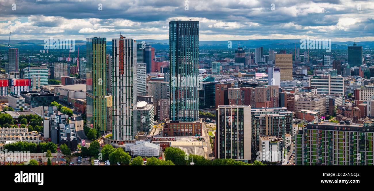 Aerial view of Manchester cityscape with skyscrapers and construction ...