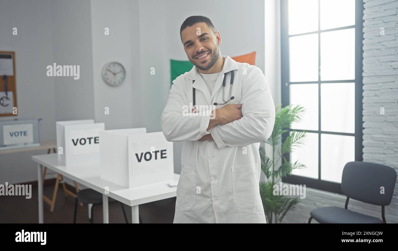 Handsome hispanic man in a voting room with his arms crossed, standing ...
