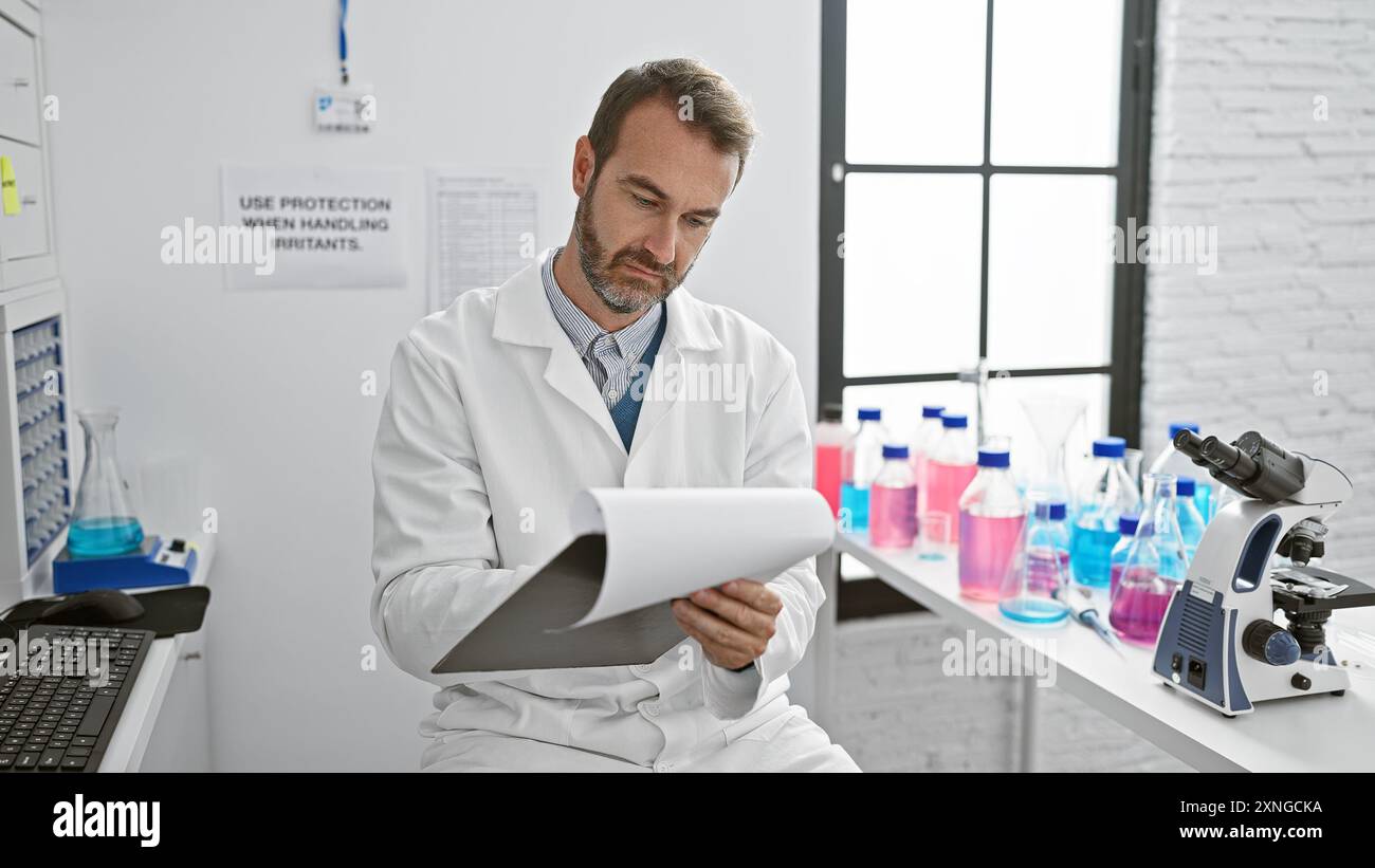 Scientist reviews data hi-res stock photography and images - Alamy