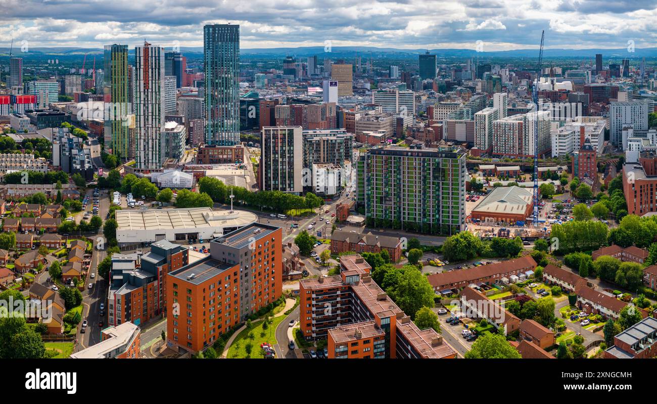 Aerial view of Manchester cityscape with skyscrapers and construction ...