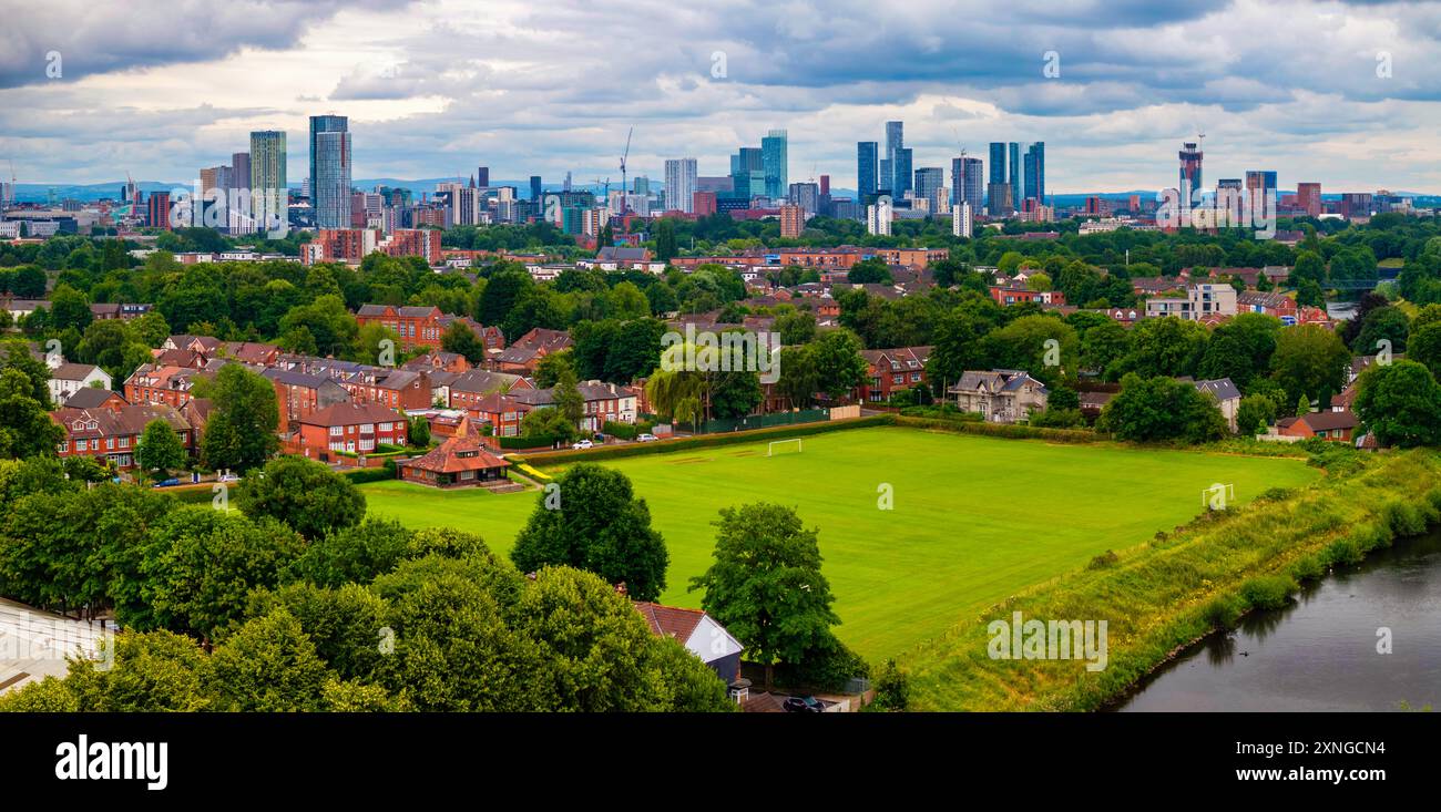 Aerial view of Manchester cityscape with skyscrapers and construction ...