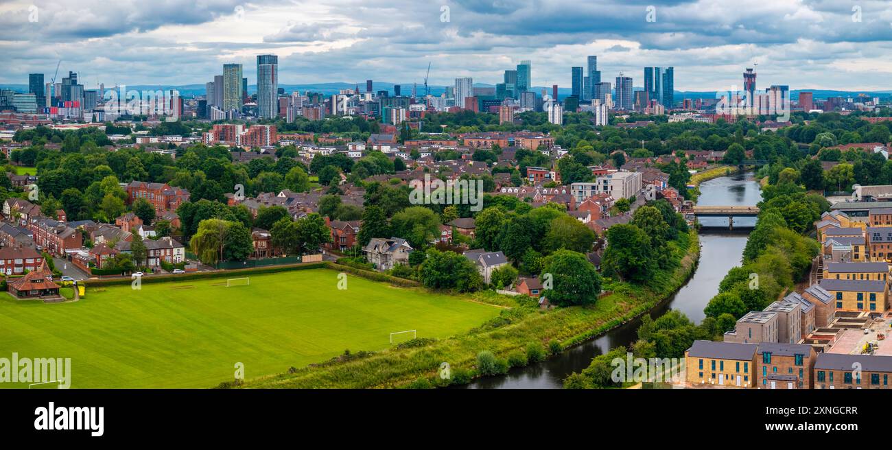 Aerial view of Manchester cityscape with skyscrapers and construction ...