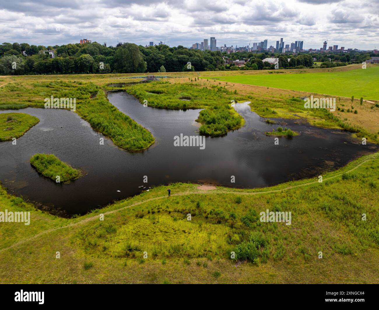 Aerial view of a newly created Kersal wetland park with Manchester city ...