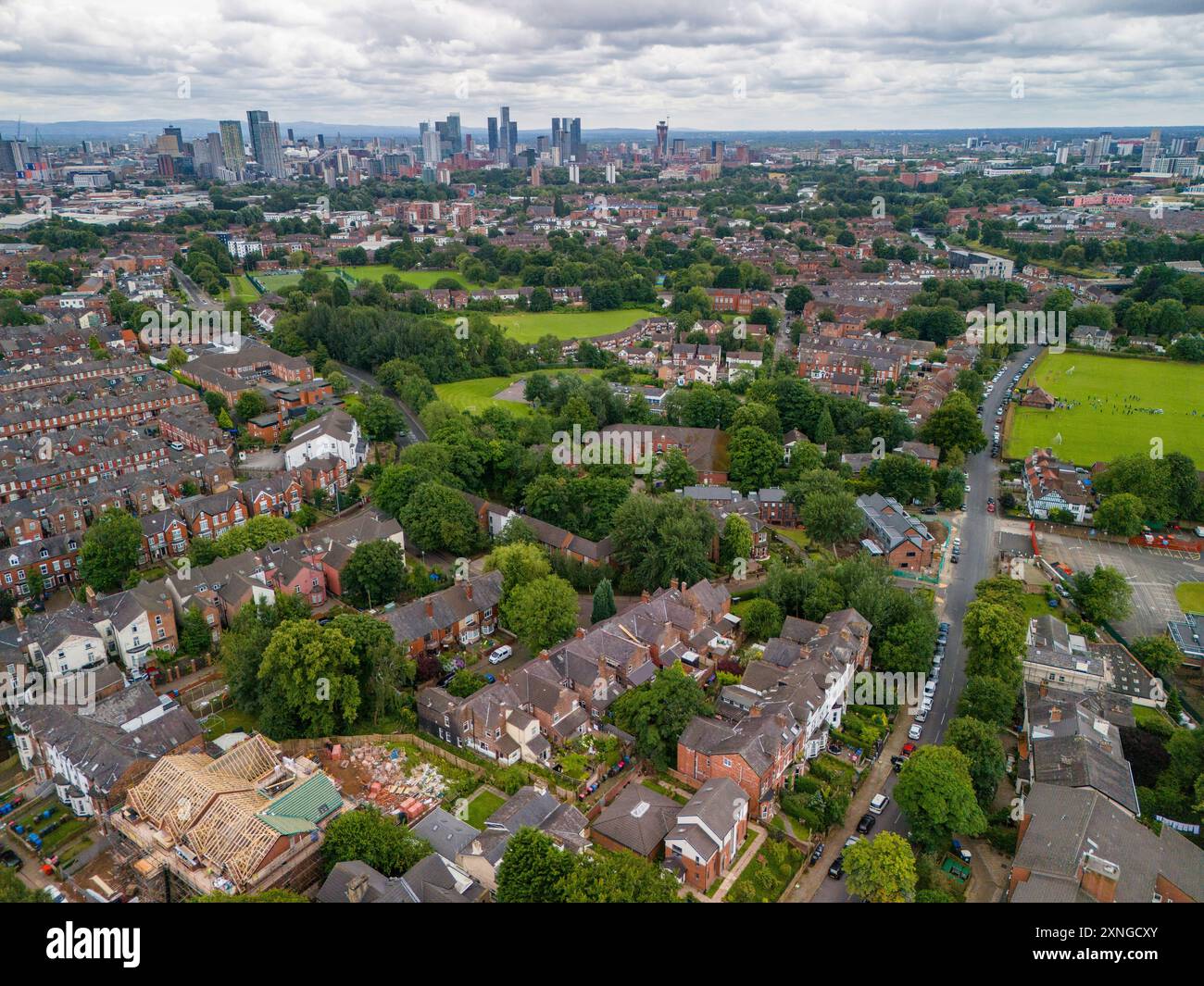 Aerial view of Manchester cityscape with skyscrapers and construction ...