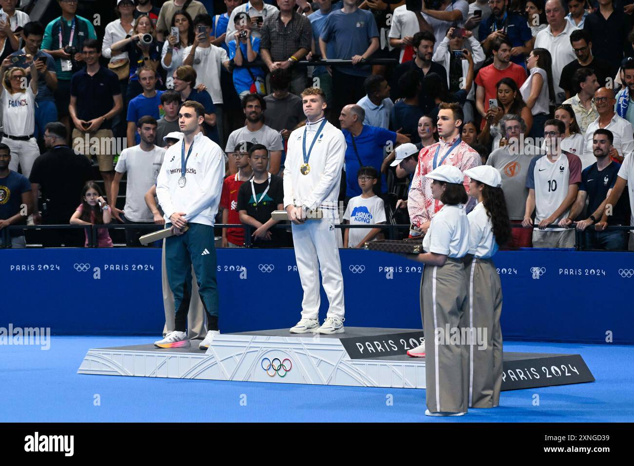 Kristof Milak ( HUN ) Silver medal, Leon Marchand ( FRA ) Gold medal, Ilya Kharun CAN ) Bronze ...