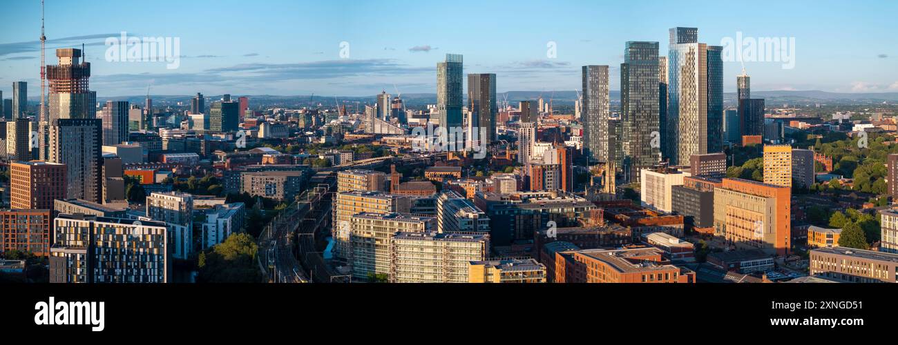 Aerial view of Manchester cityscape with skyscrapers and construction ...