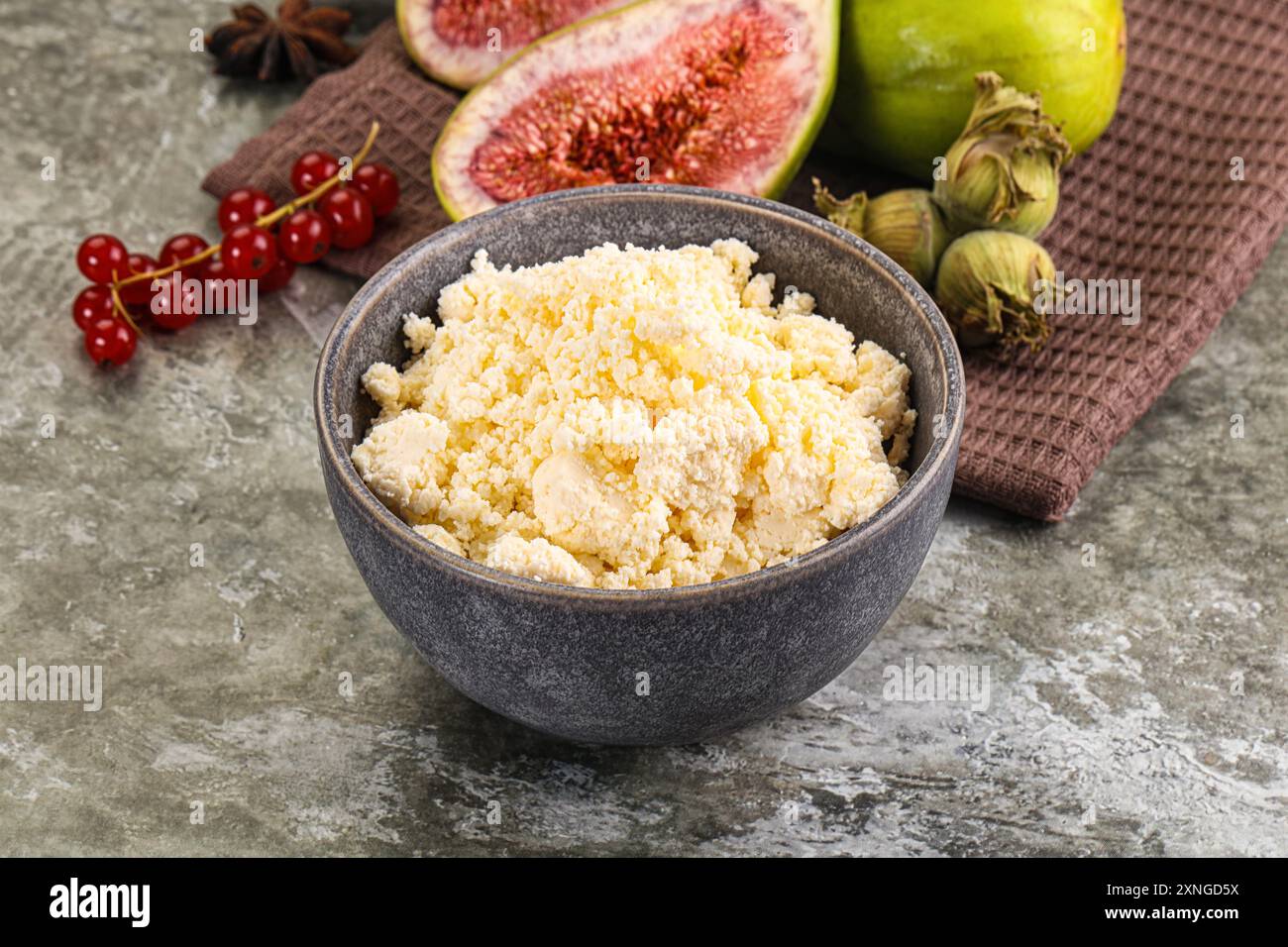 Delicous sheep cottage cheese curd served fig Stock Photo - Alamy