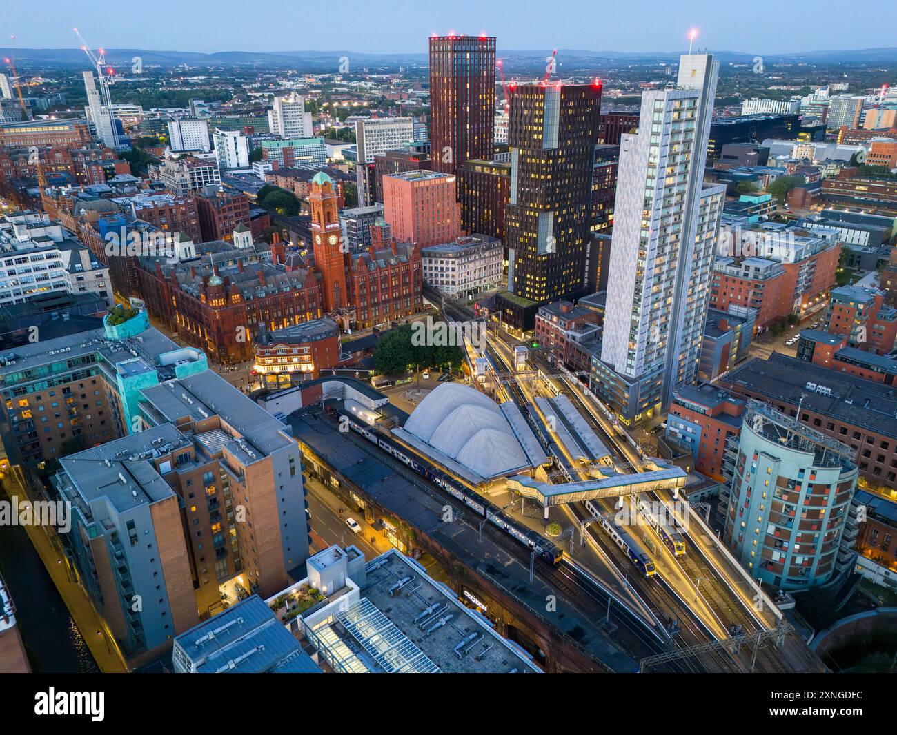 Aerial view of Manchester cityscape with skyscrapers and construction ...