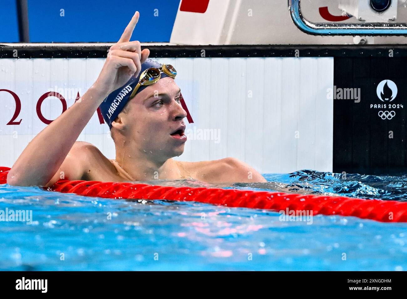 Paris, France. 31st July, 2024. Leon Marchand of France celebrates ...