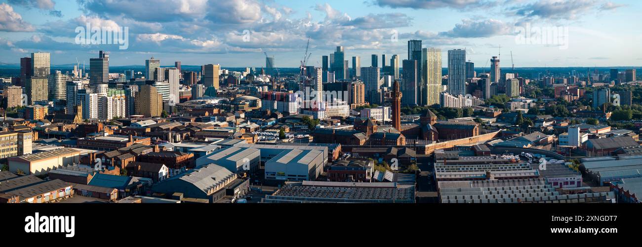 Aerial view of Manchester cityscape with skyscrapers and construction ...