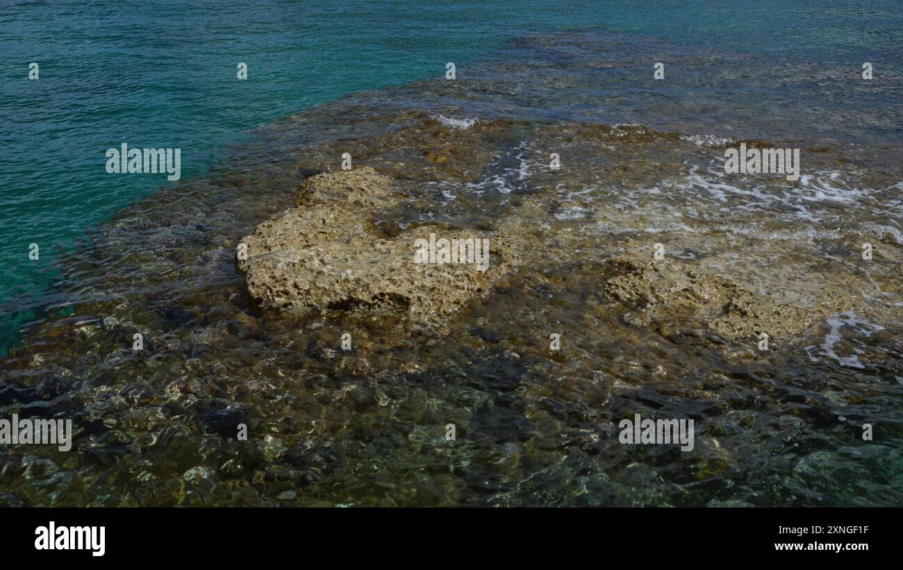 Stunning coastal rock formation with crystal-clear waters in salento ...