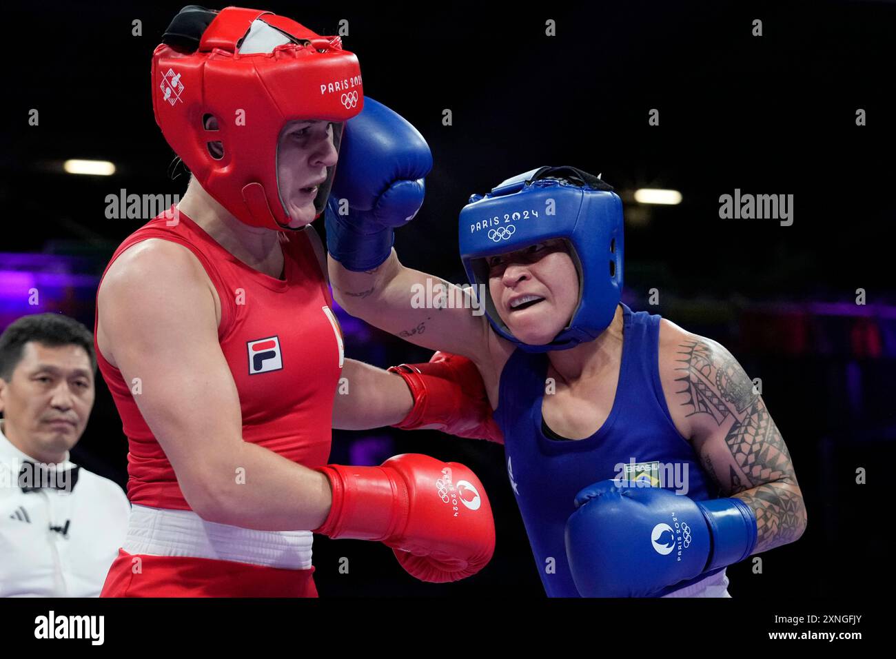 Brazil's Beatriz Soares hits Netherlands' Chelsey Heijnen in their ...