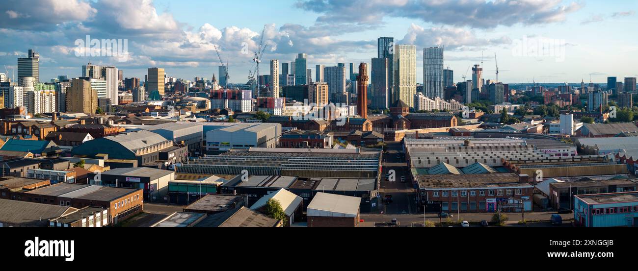 Aerial view of Manchester cityscape with skyscrapers and construction ...