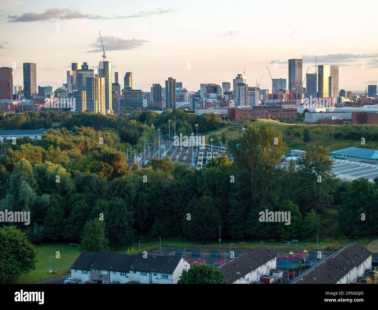 Aerial view of Manchester cityscape with skyscrapers and construction ...