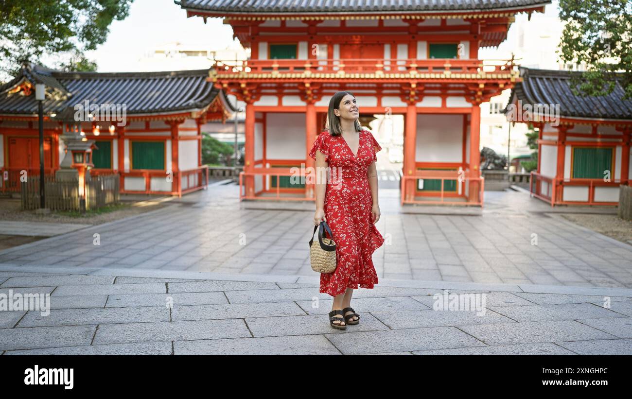 Cheerful beautiful hispanic woman enjoying the traditional grandeur of ...